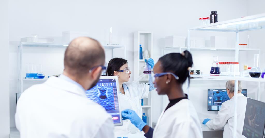 Scientists At Work In A Lab