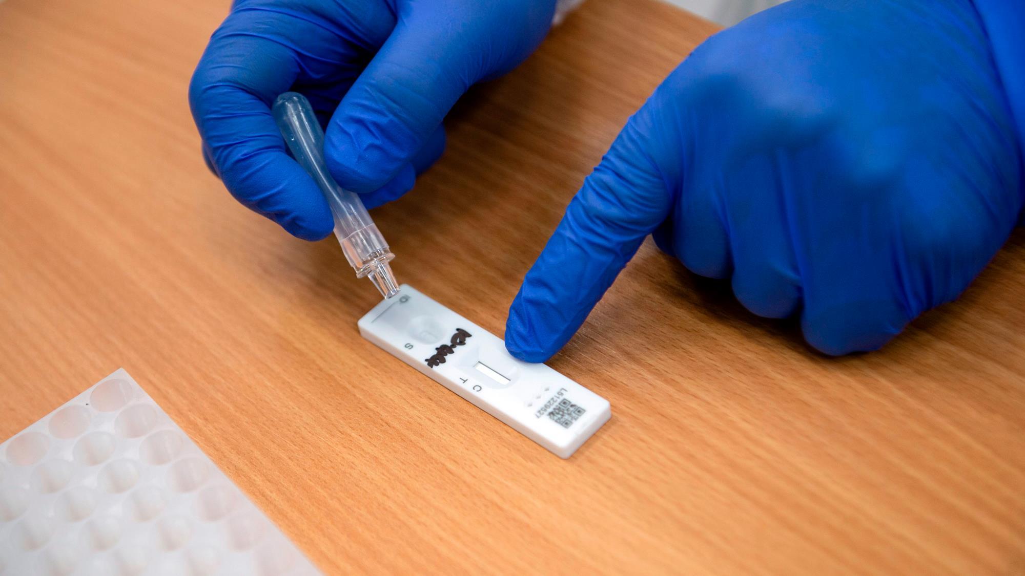 UK abandons school Covid monitoring as testing devices divide public ...